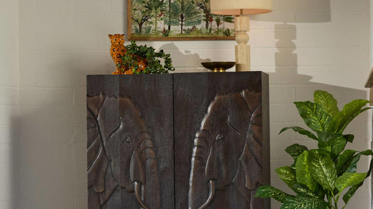 Discover the elegant handcrafted elephant storage cabinet from World Market