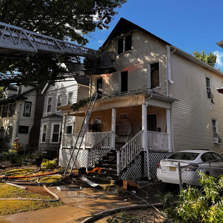 Woman dies after 3-alarm fire tears through New Brunswick home