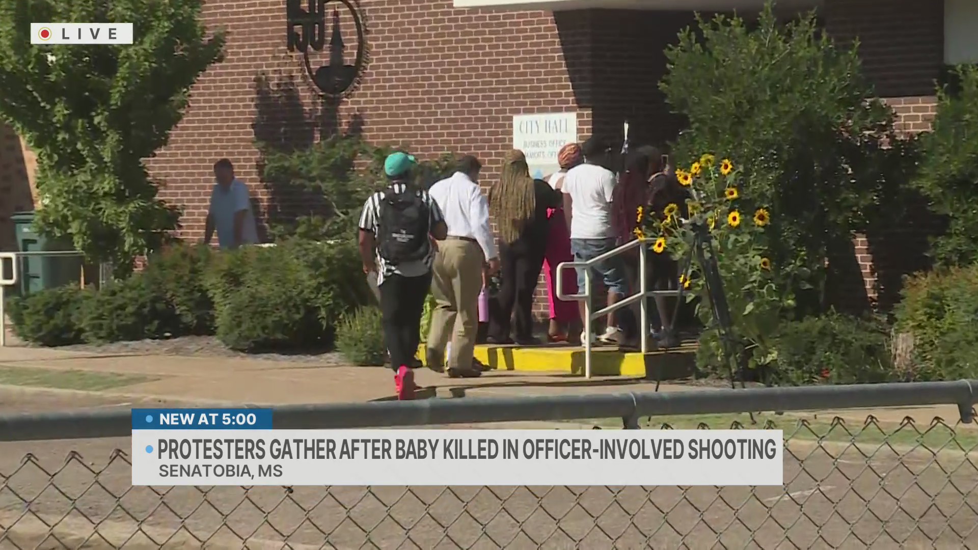 Community gathers outside Senatobia City Hall after toddler shot, killed
