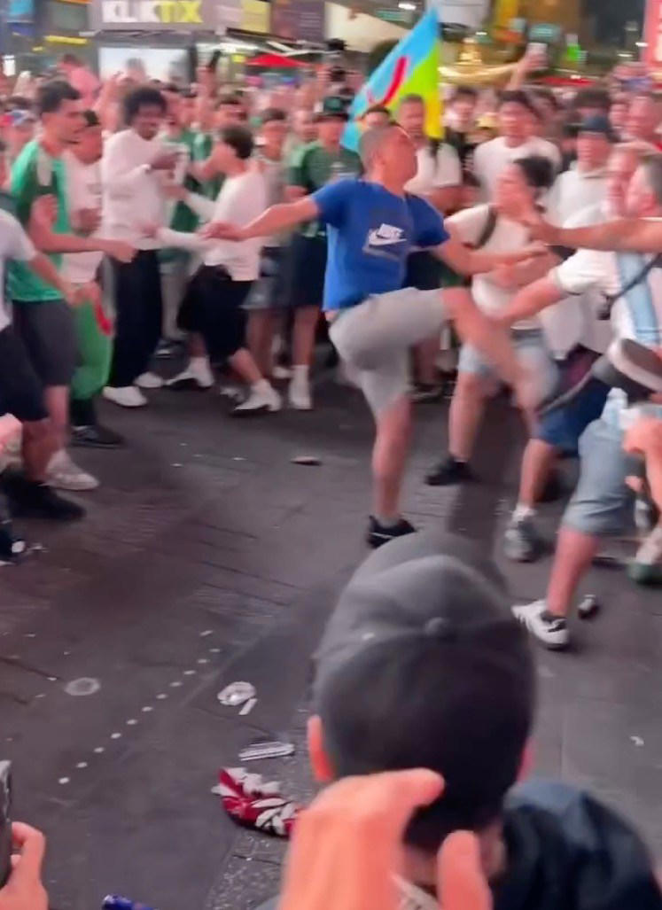 Brawl erupts between mob of Argentinian and Algerian soccer fans in ...
