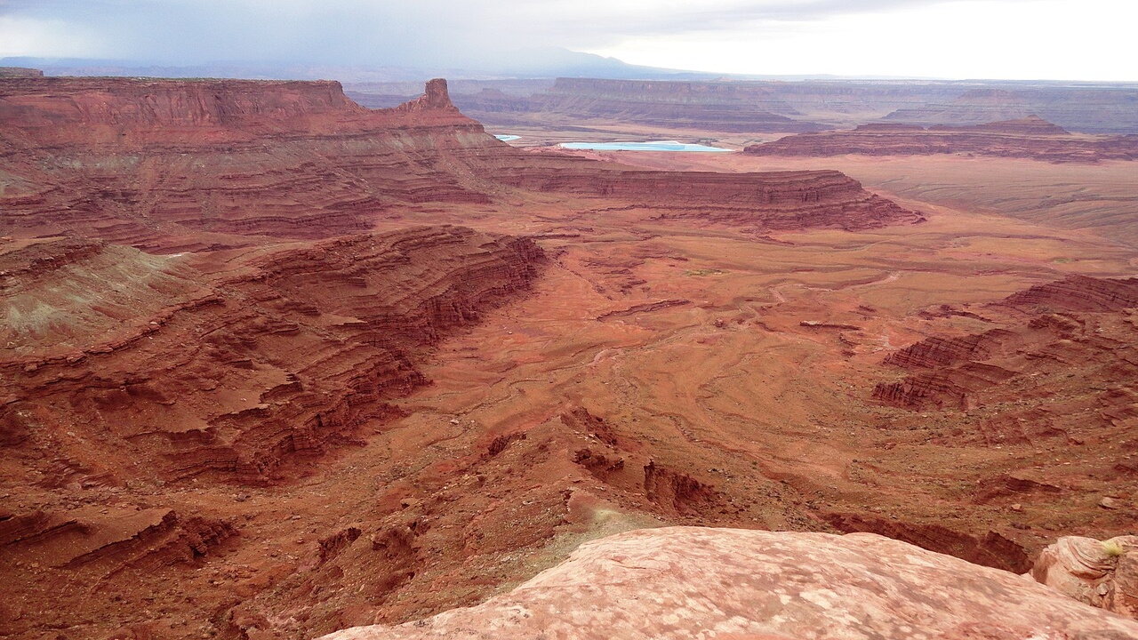 You stand 2,000 feet above the Colorado River at this grim-named Utah ...