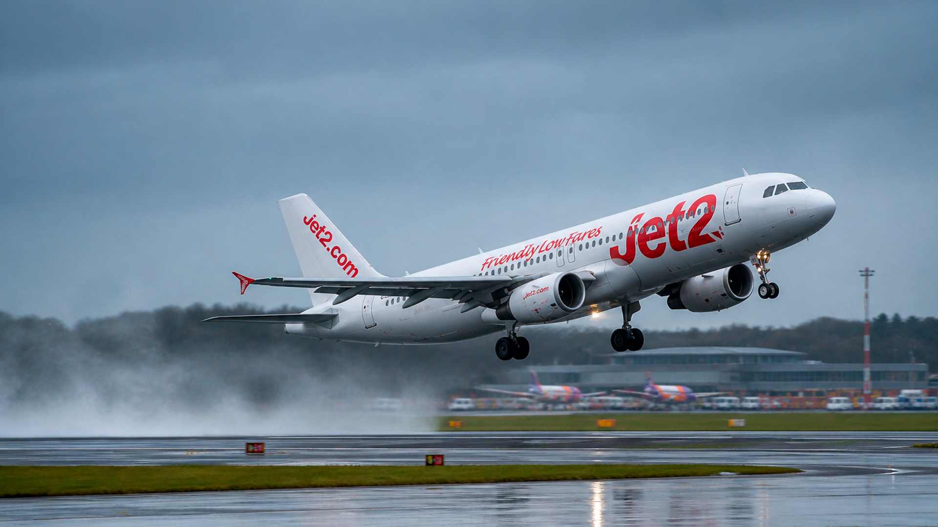 Jets blast through spray on takeoff