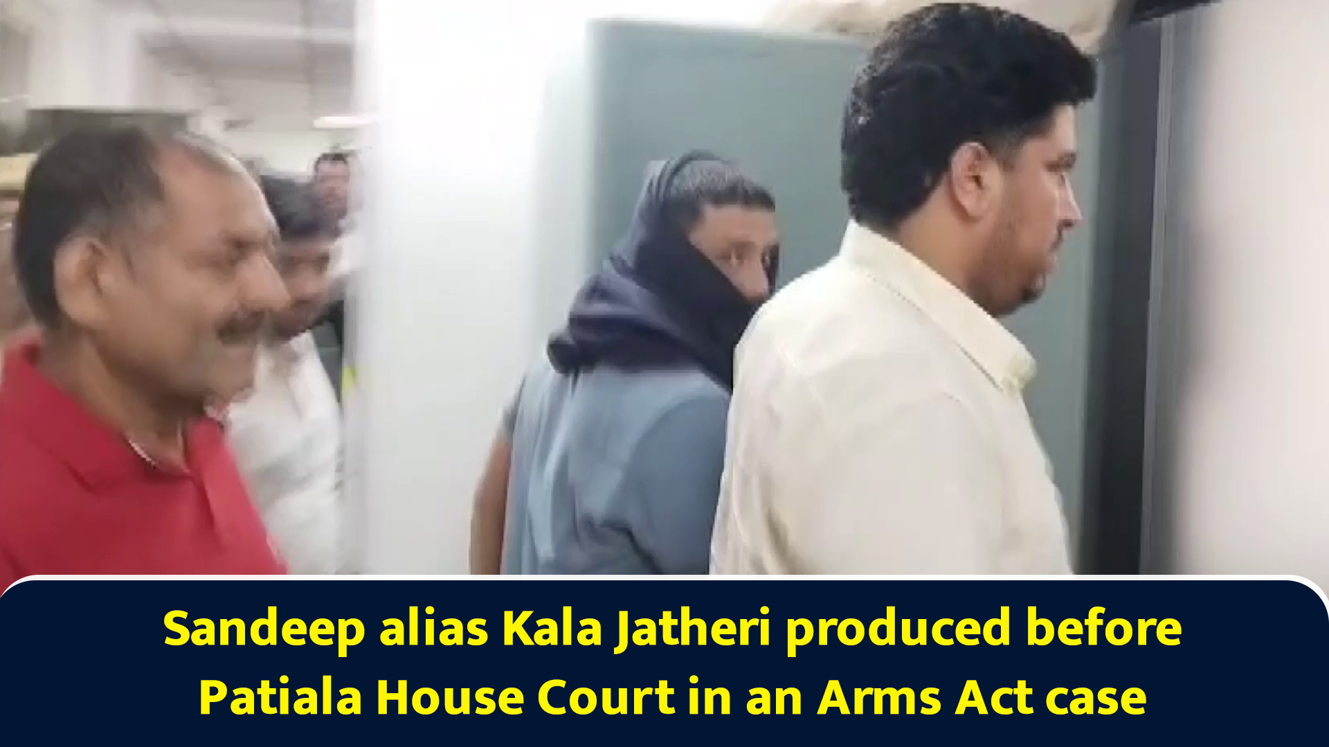 Sandeep alias Kala Jatheri produced before Patiala House Court in an ...