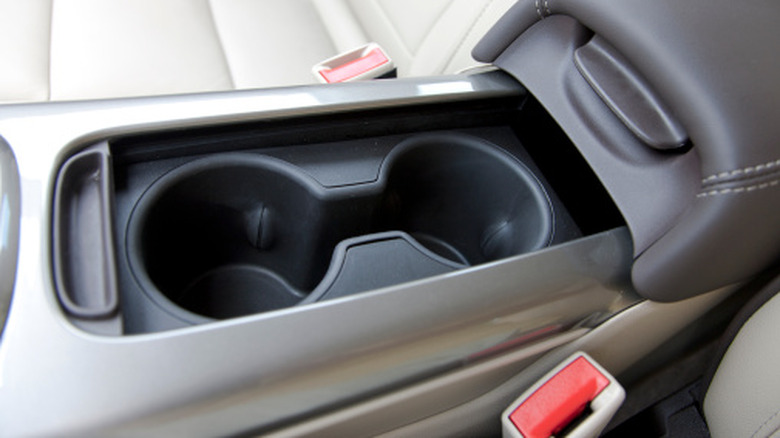 This may be what the gap in between your car's cup holders is actually for