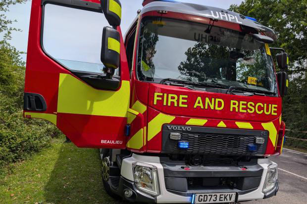 Car trapped down embankment after crash closes Beaulieu road