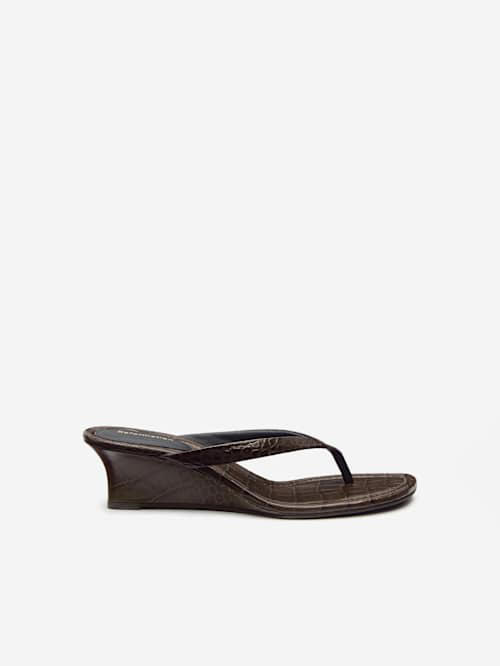 Wedge flip-flops are the latest take on the easy-to-wear sandal trend ...
