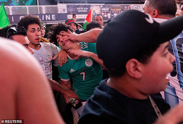 World Cup party descends into ugly brawl as Argentina and Algeria fans ...