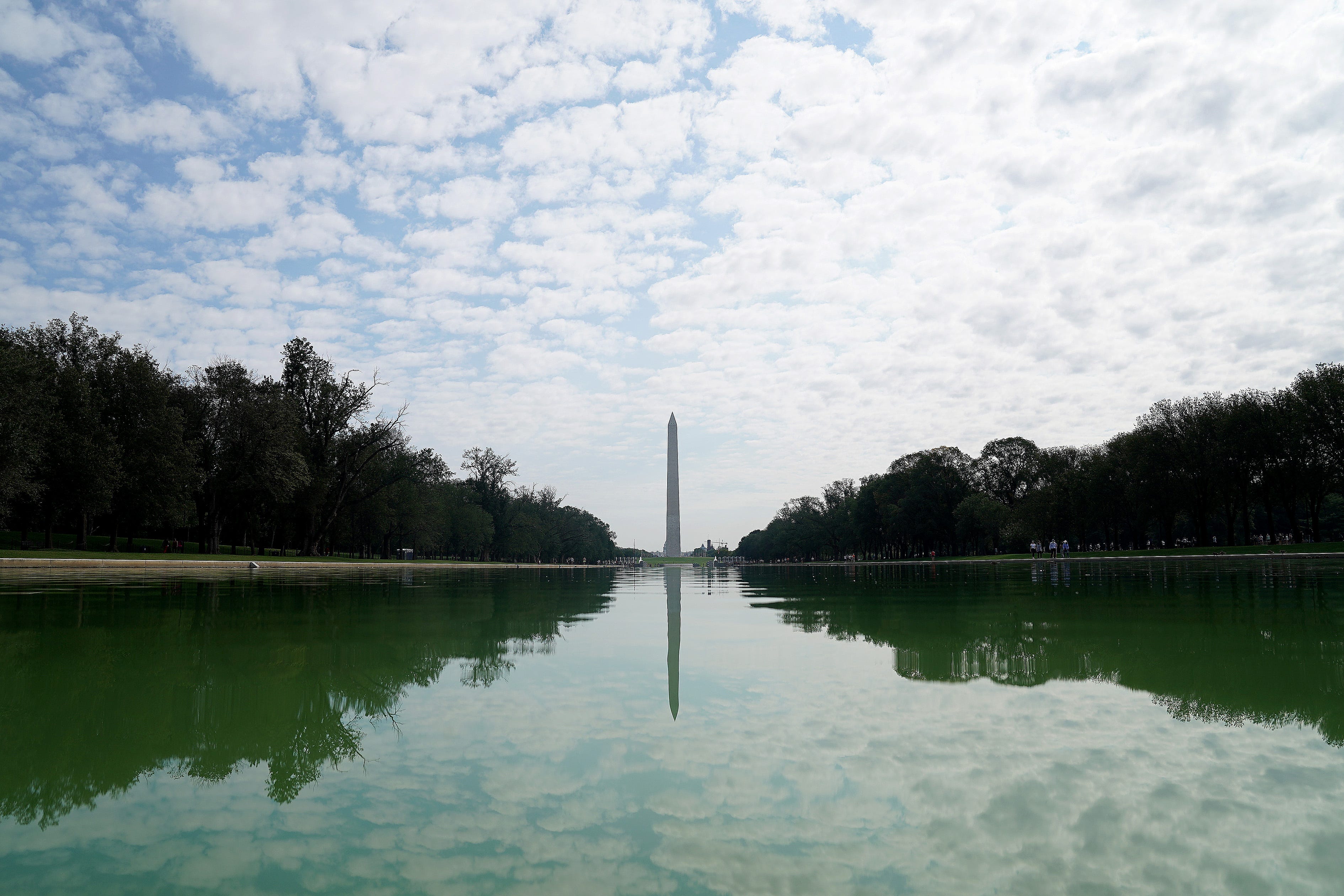 Lincoln Memorial Reflecting Pool before blue paint job vs after