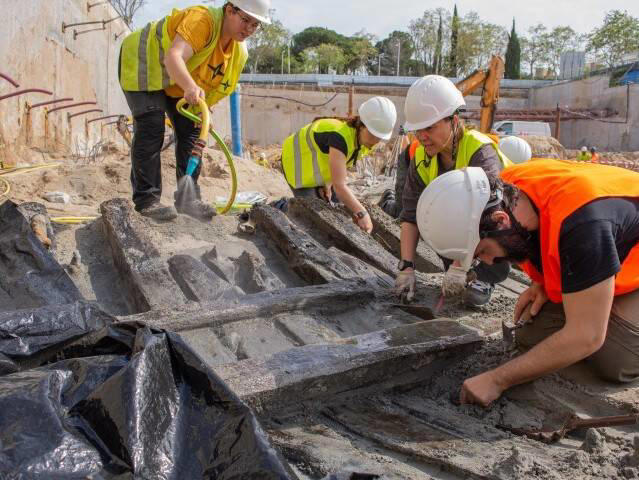 Workers preparing to construct a parking garage in Barcelona just ...