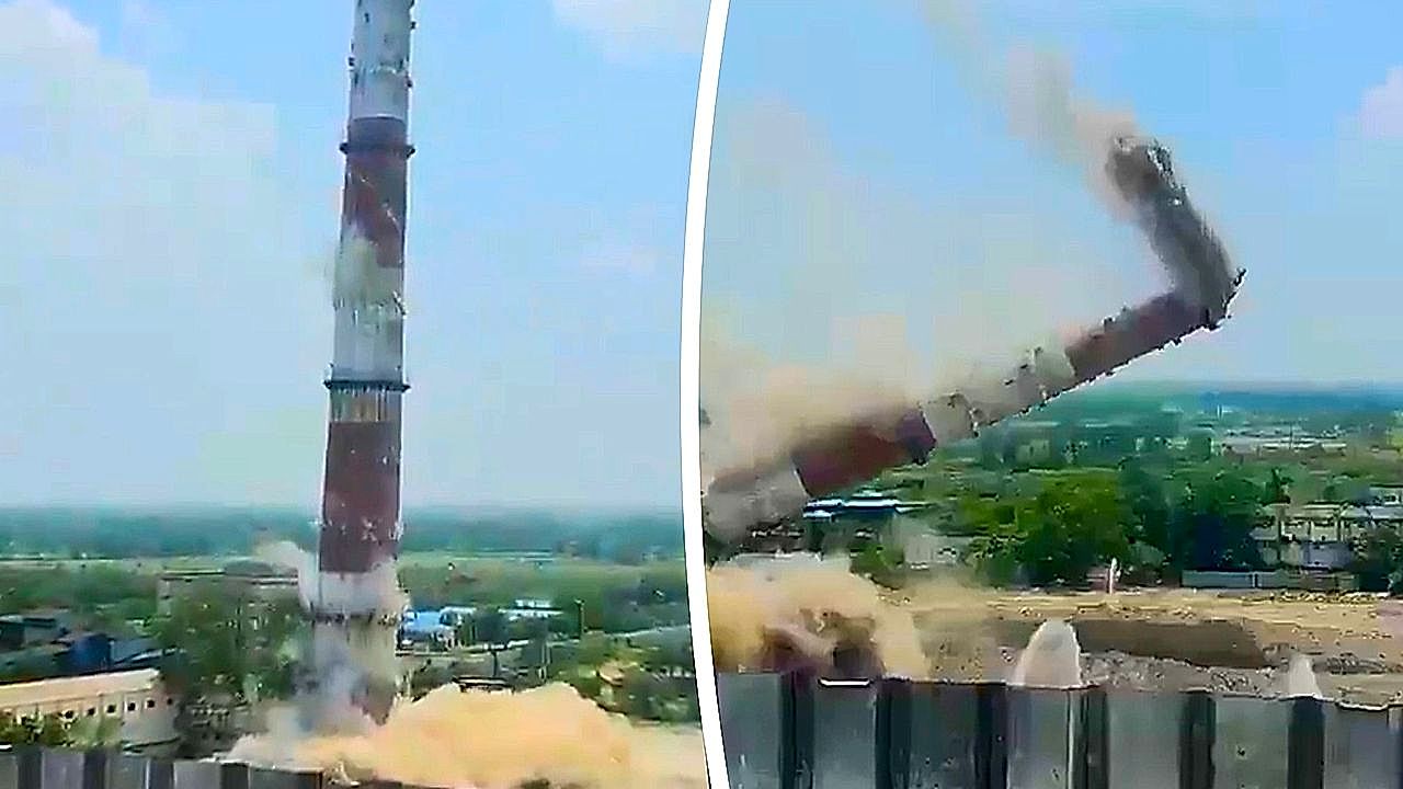 Historic chimney collapses in controlled demolition at power plant