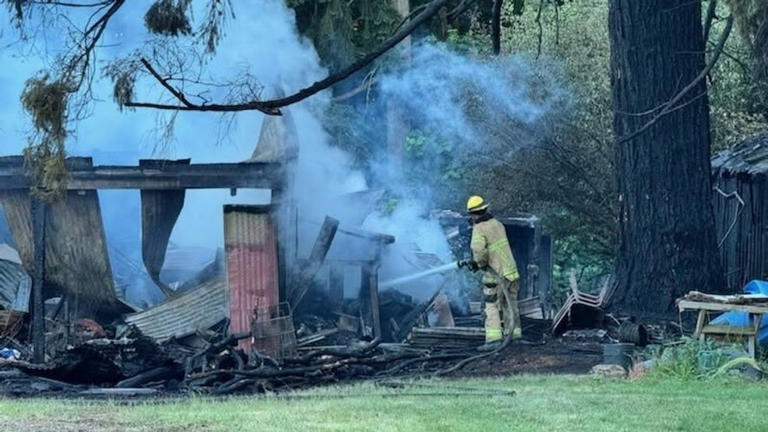 Firefighters put out house, shop fire burning in Ridgefield