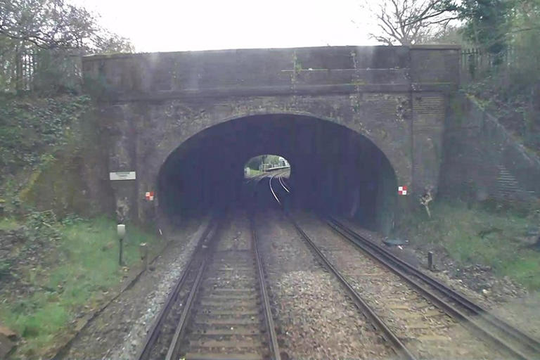 Rail workers came seconds from being crushed by London passenger train