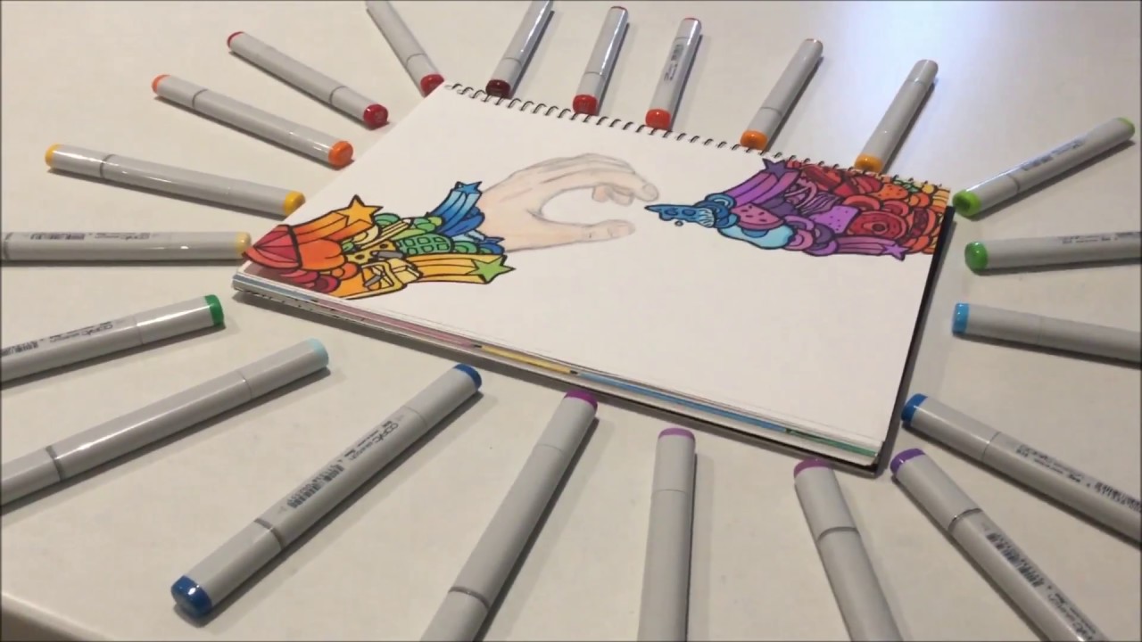 Realistic hand surrounded by explosive doodle art