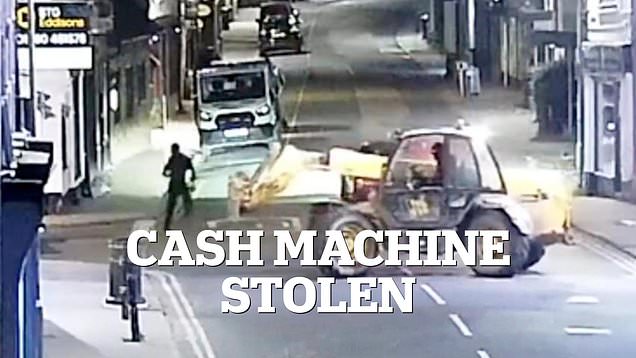 Thieves use a stolen telehandler to rip away a cash machine