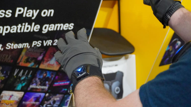 I tried bhaptic's new VR vest and gloves, and it's more immersive than ever