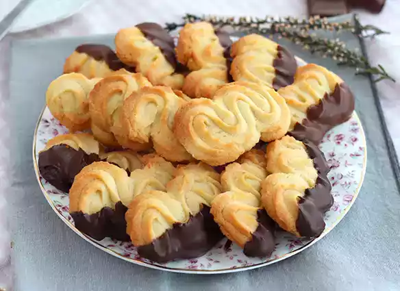 Galletas spritz con chocolate (pastas de té)