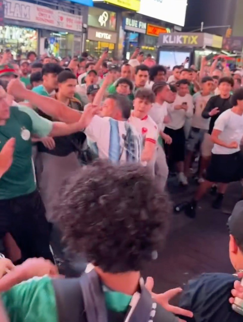 Brawl erupts between mob of Argentinian and Algerian soccer fans in ...