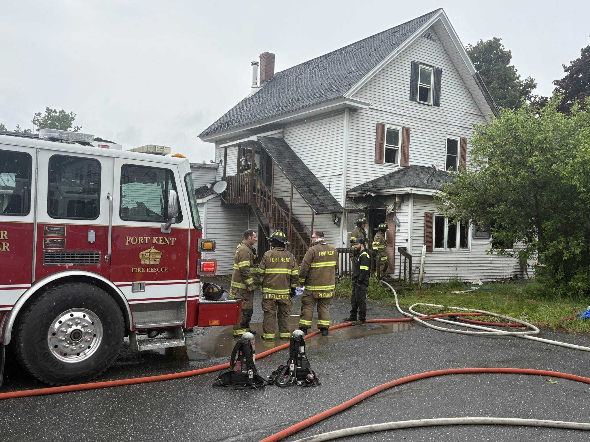Firefighters unable to save woman after fire burns apartment building ...