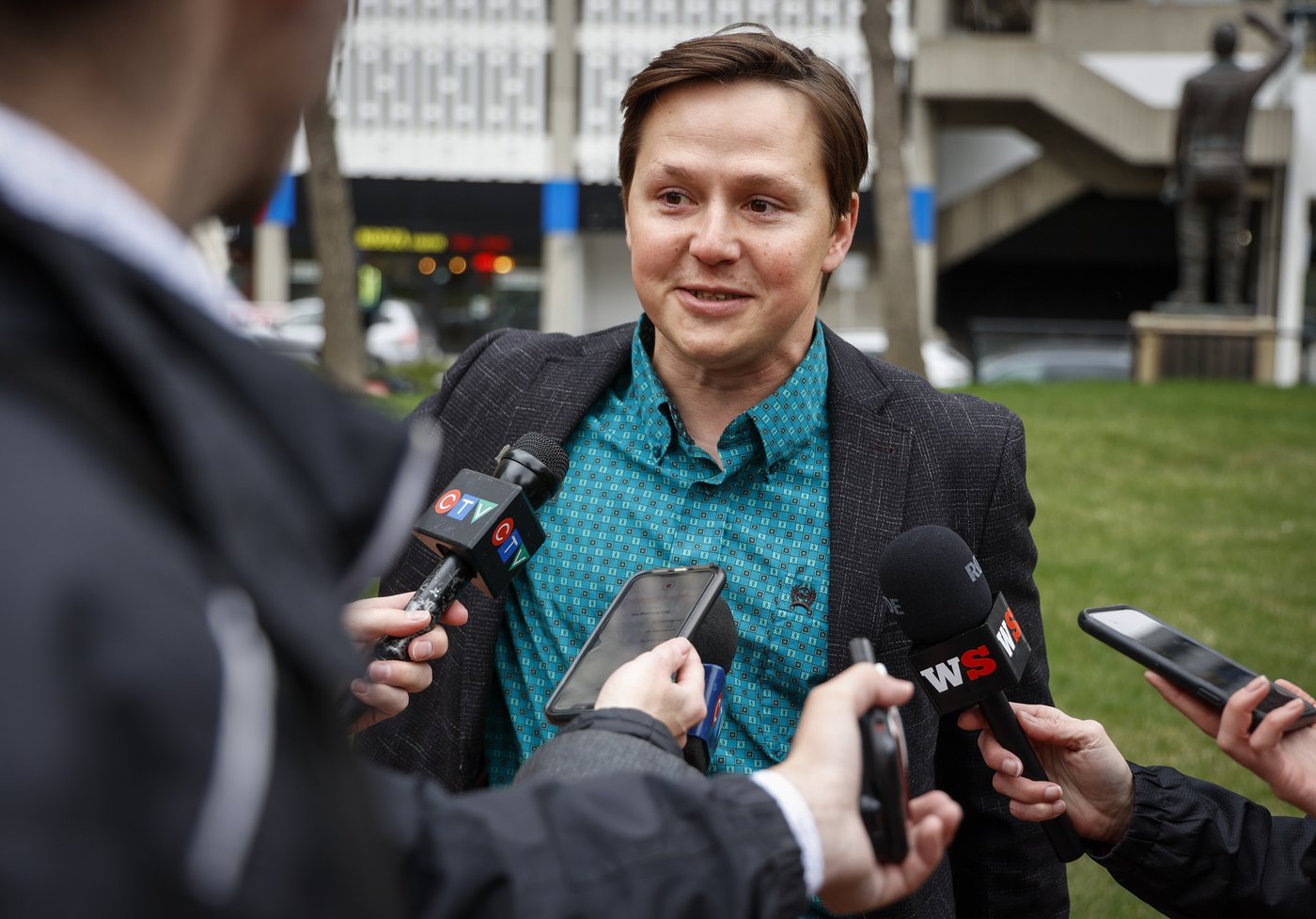 Pothole protest: Frustrated Albertans fill road ruts in act of civil ...