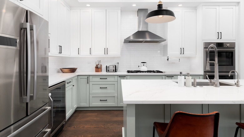 11 cabinet colors that pair perfectly with dark wood floors
