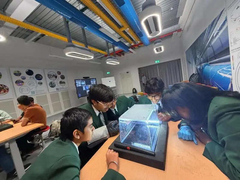 Five DPS MIHAN students take microrobots project to CERN, walk where ...