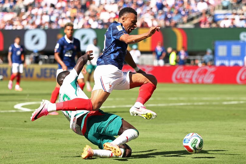 Controversial Kylian Mbappe penalty call sparks debate as France win ...