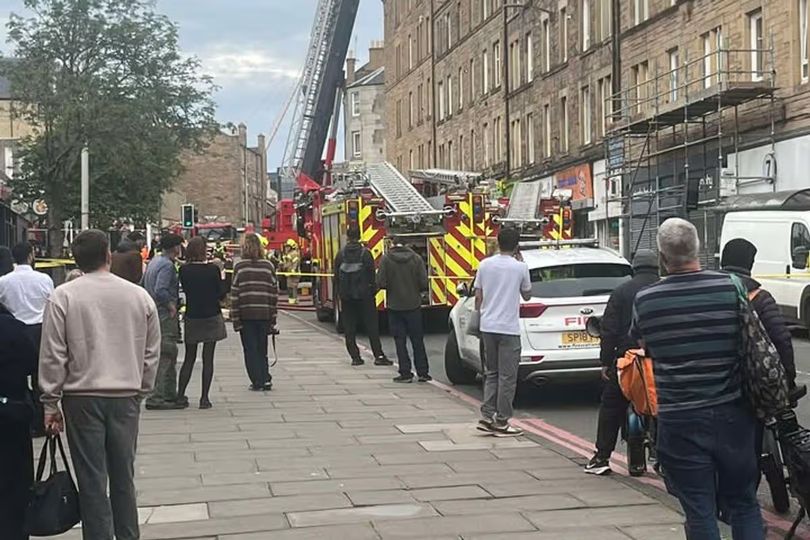 Fire crews battle Edinburgh shop blaze as residents evacuated and ...