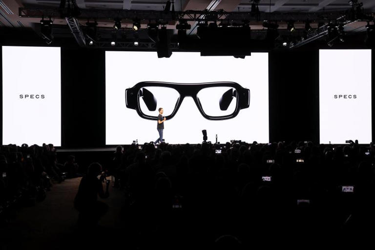 Snap unveils its $2,195 augmented reality glasses as rivalry with Meta ...