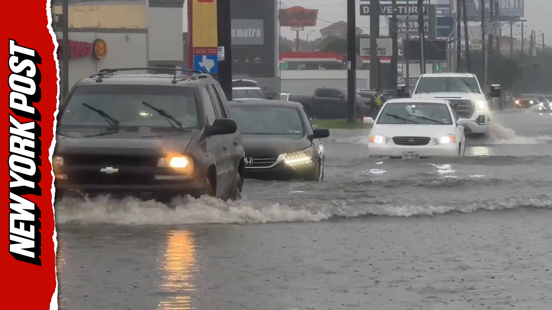 Drivers trapped as Houston flash floods turn roads into rivers