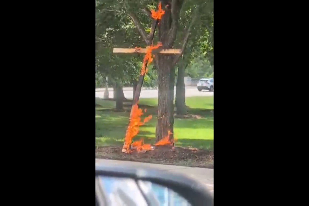 Person in custody in cross burning probe after student came forward