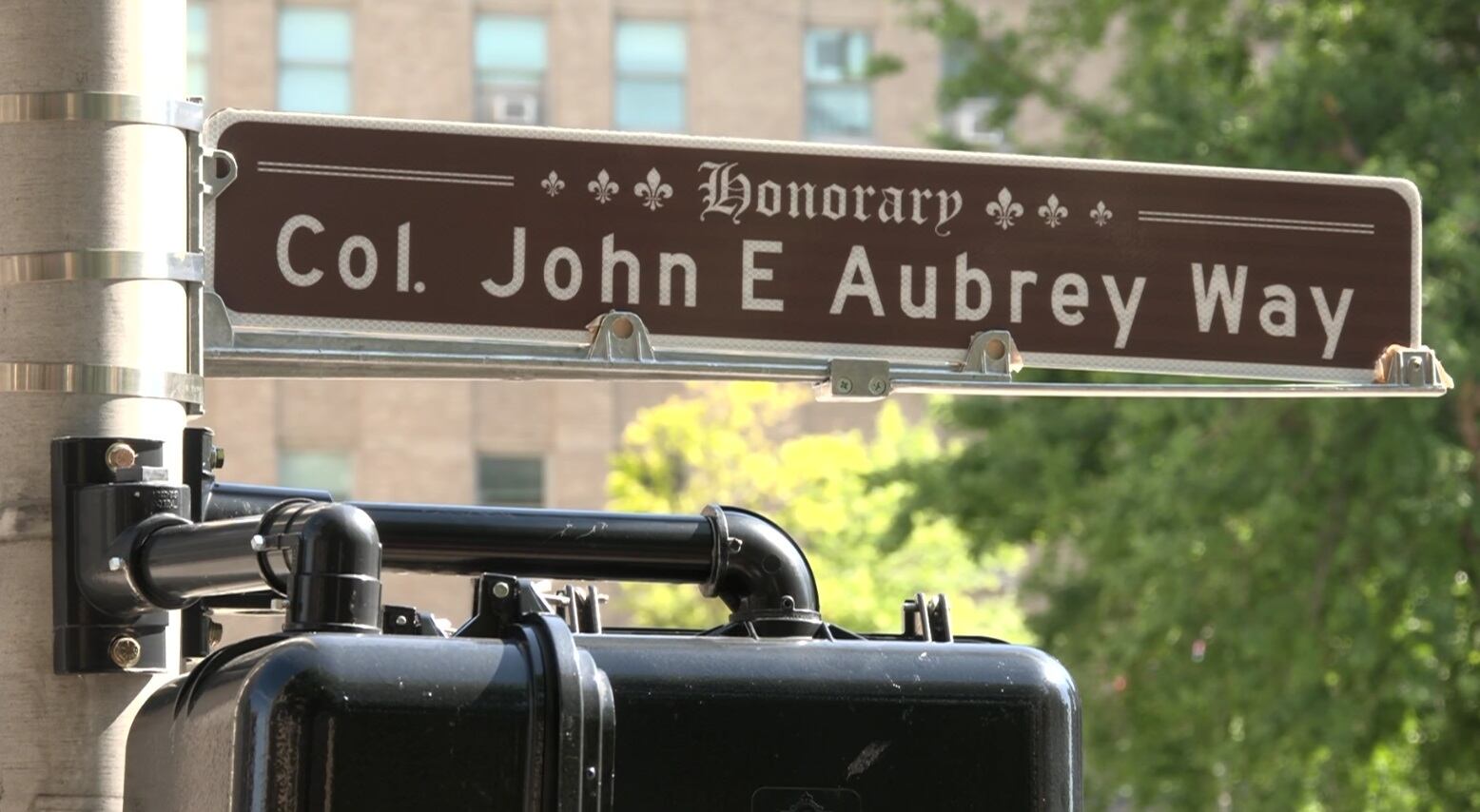 Street sign dedicated to the late Jefferson County Sheriff John Aubrey ...
