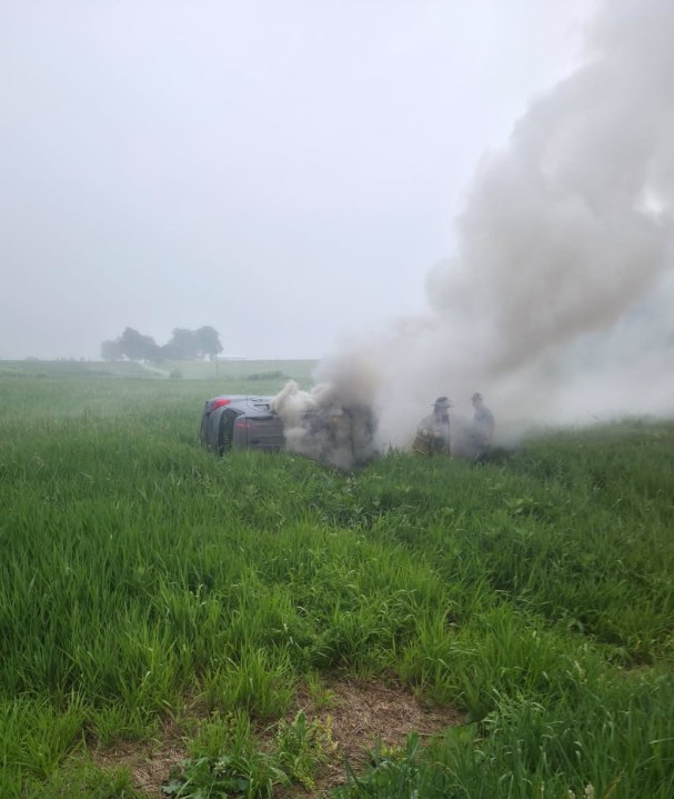 ISP troopers, civilians rescue driver from burning car
