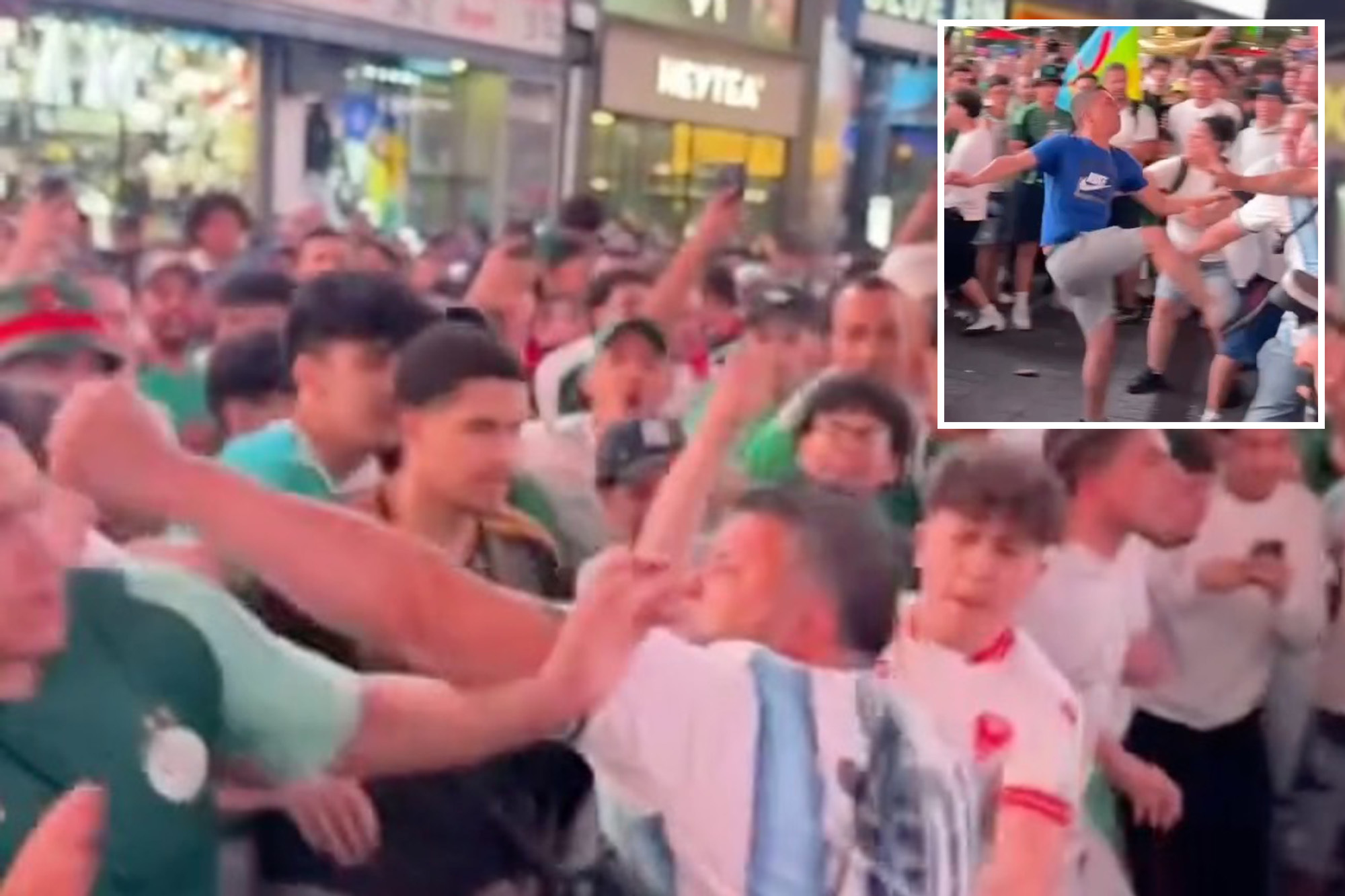 Brawl erupts between mob of Argentinian and Algerian soccer fans in ...