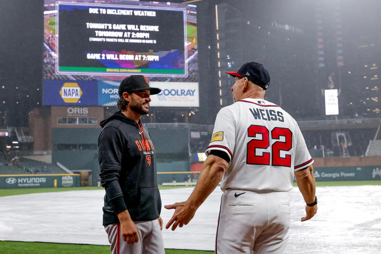 Braves-Giants game suspended by rain, to resume Wednesday at 2 p.m ...