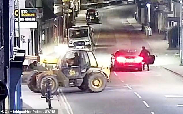 Moment balaclava-clad thieves use a stolen telehandler to rip a cash ...