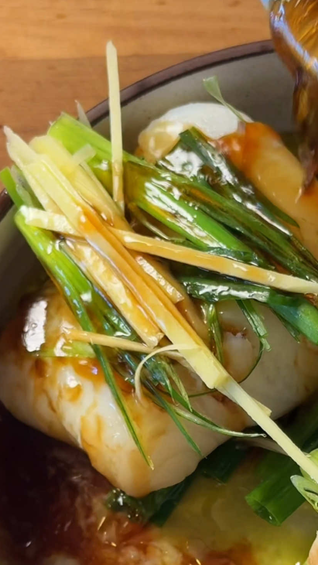 Light and flavorful steamed fish with ginger and soy sauce
