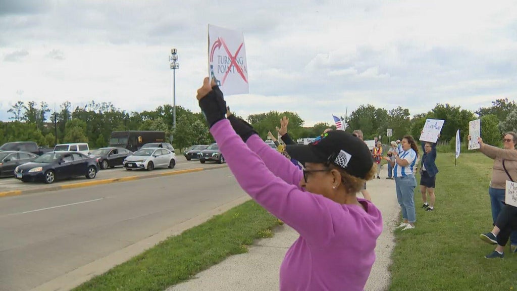 Protesters rally outside Turning Point USA educators' summit in ...