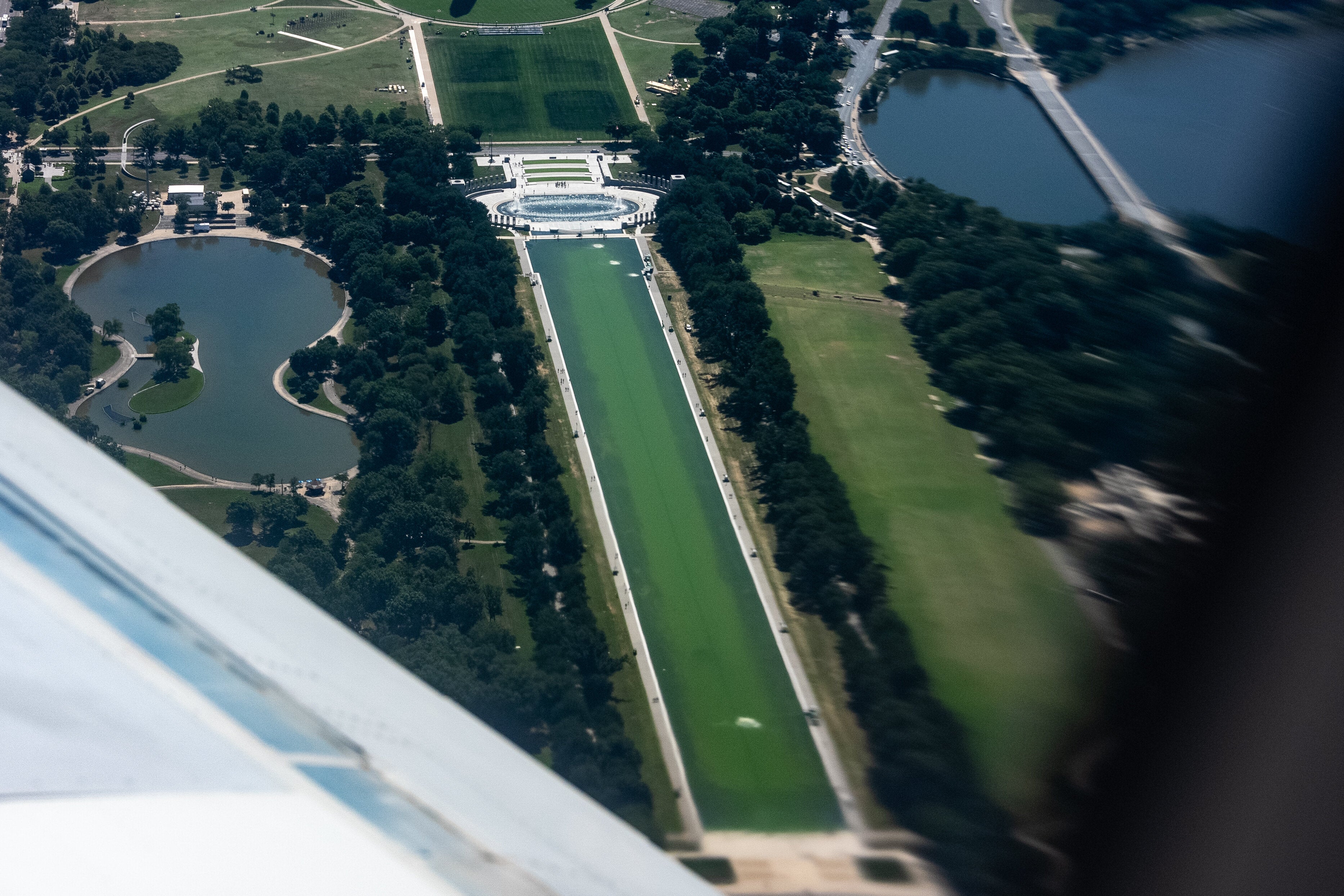 Critics pounce on Trump's algae-filled reflecting pool as officials ...