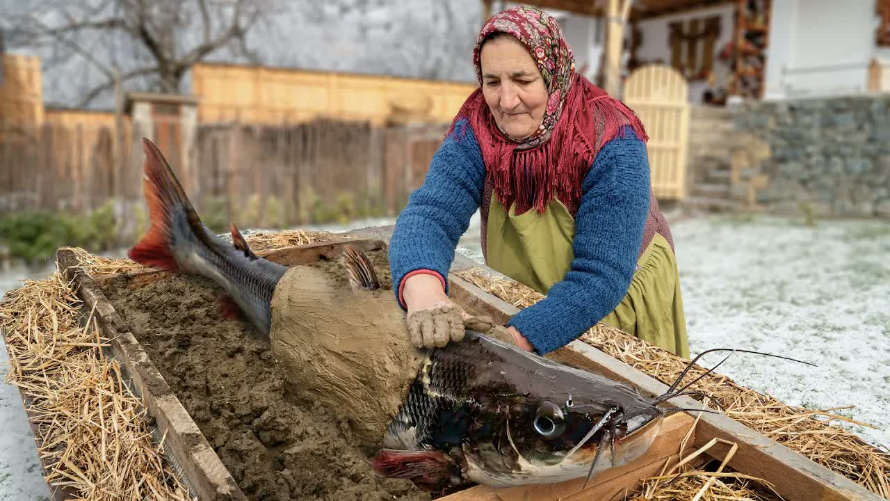 The village tradition of cooking fish beneath hot coals