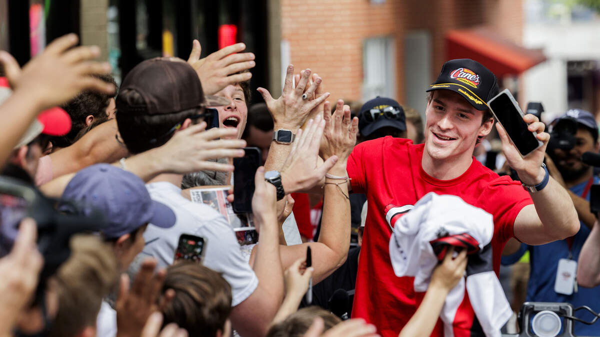 Chicken and a champion. Raising Canes hosts Andrei Svechnikov for promo ...