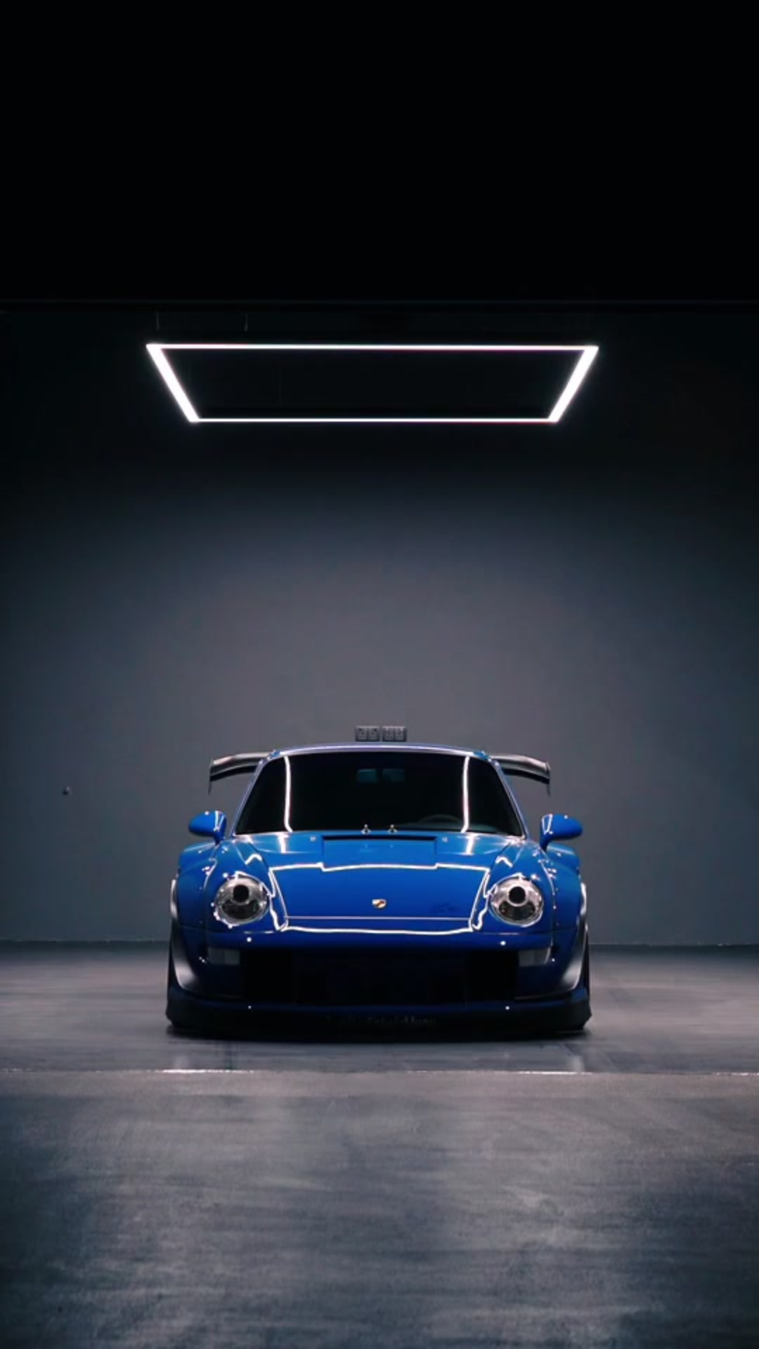 Dubai garage showcase featuring a blue Porsche 993 RWB build