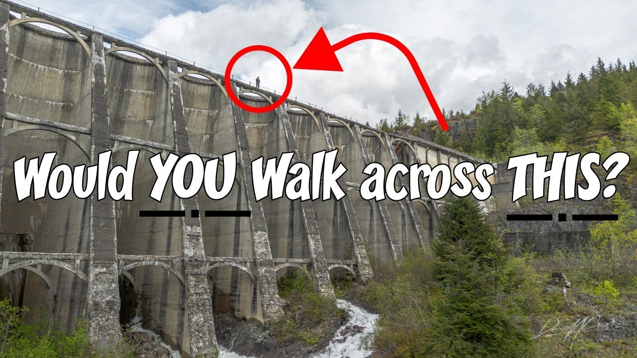 Exploring a dangerous abandoned dam: Would you walk across?