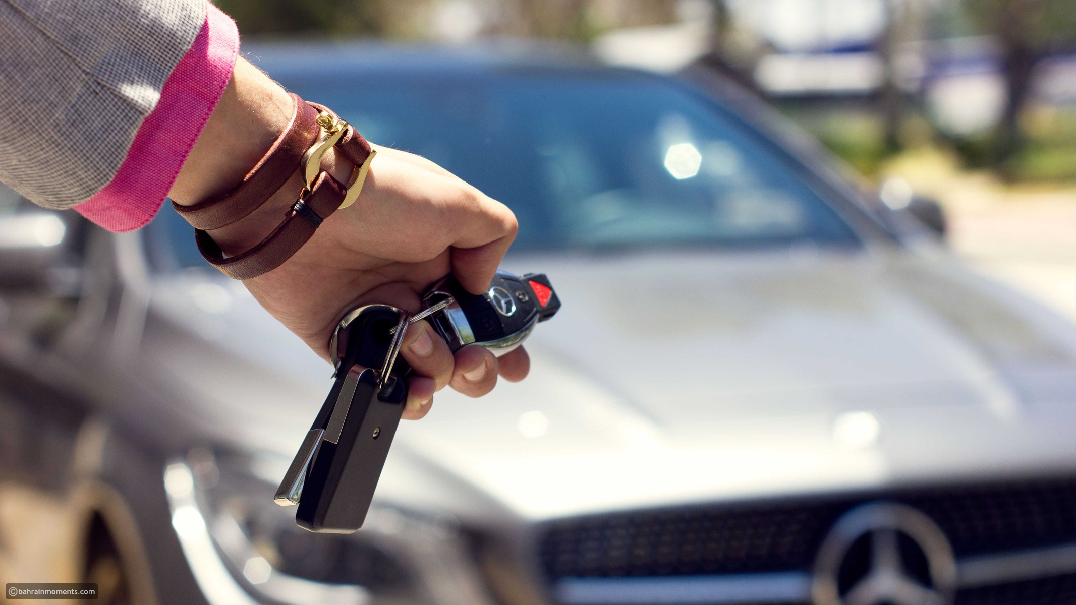 Why your car door handle has a black dot most people ignore