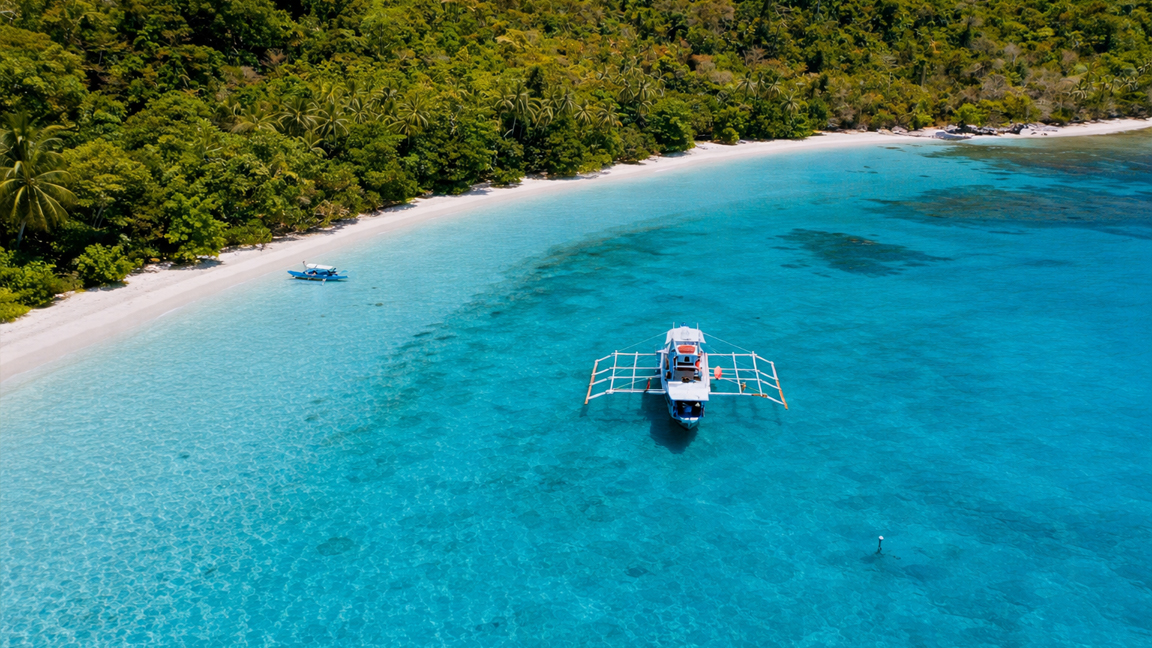 A boat floating above a sea of glass