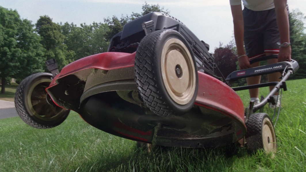 Safe and effective lawn mower blade cleaning