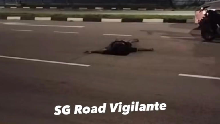 Drunk man blocked vehicles by laying down in the middle of the road