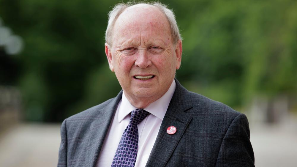 TUV MP criticised over 'racist' cartoon posted on social media