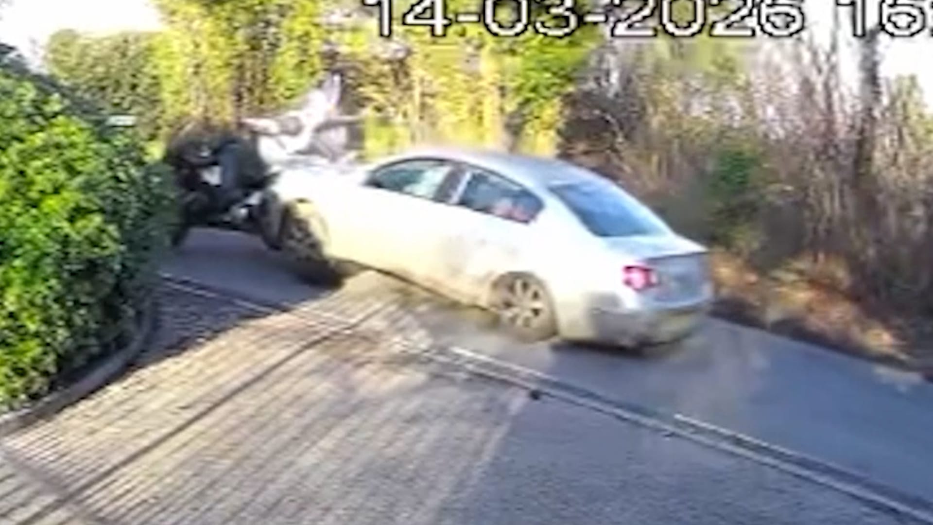 Moment drunk driver rams into back of motorcyclist