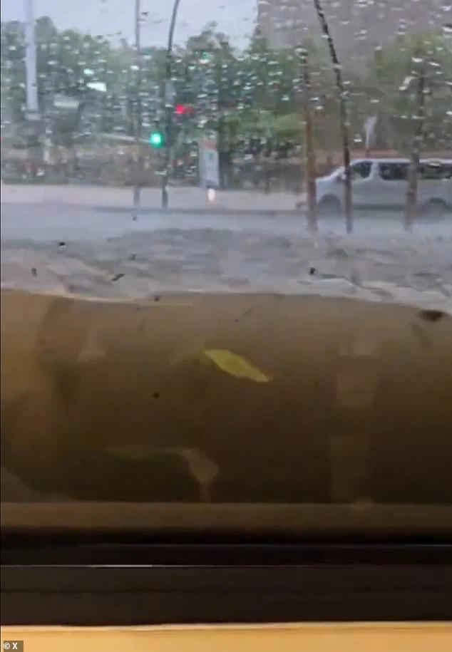 Incredible floods hit southern Spain with pedestrians swept along ...