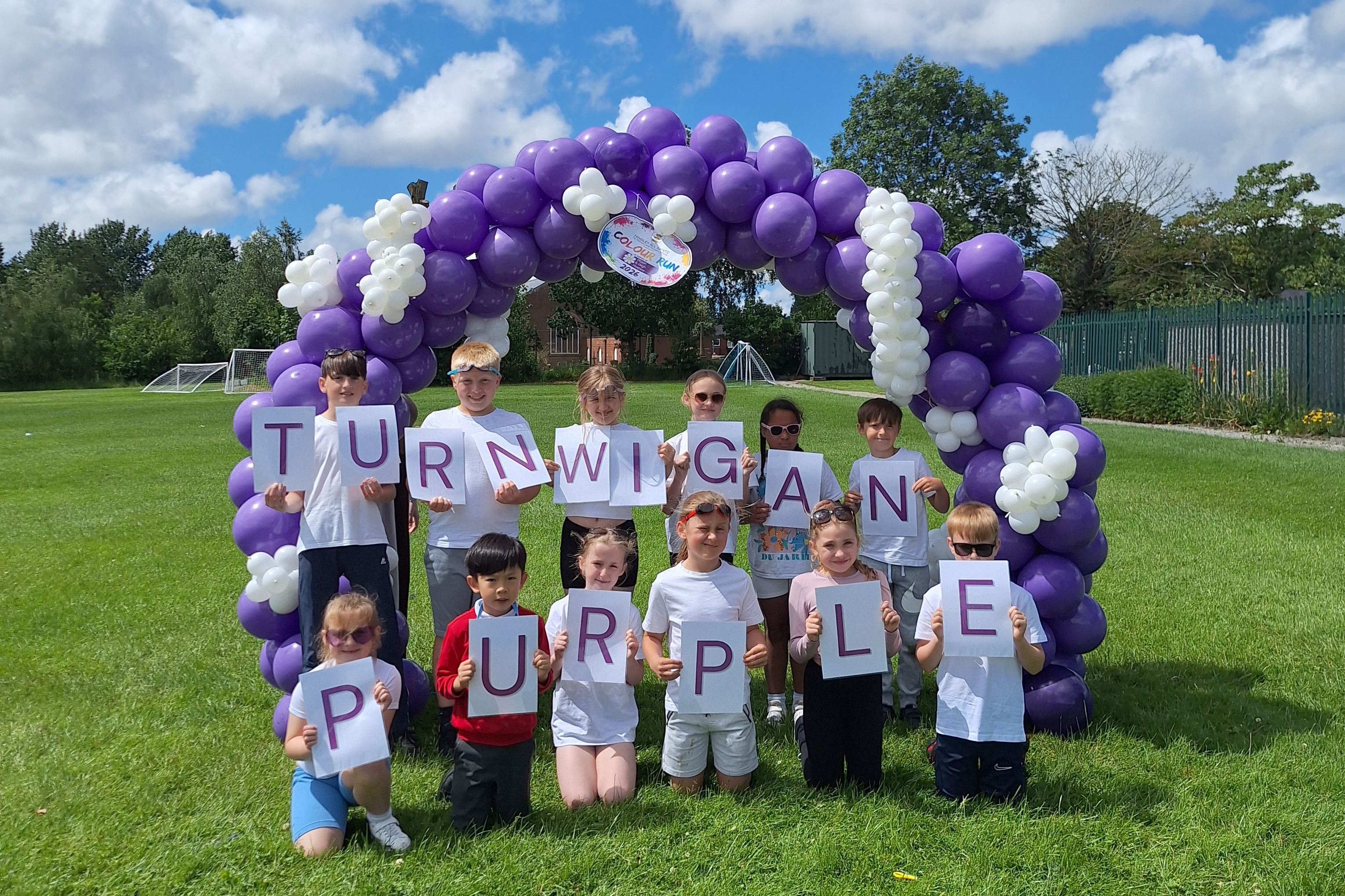 A Wigan school colour run has raised a massive £6,300 for the borough ...